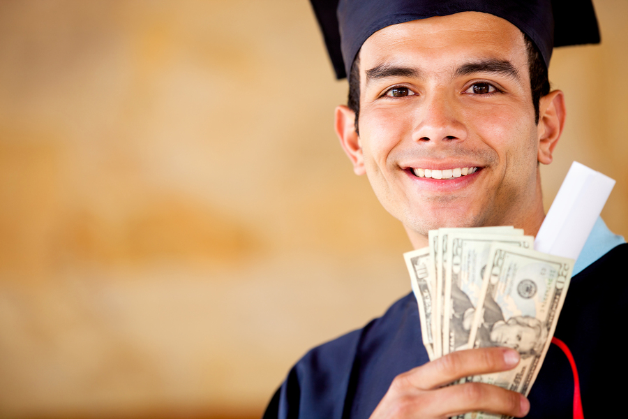 A graduate holding money and a diploma. – Do It Yourself College Rankings